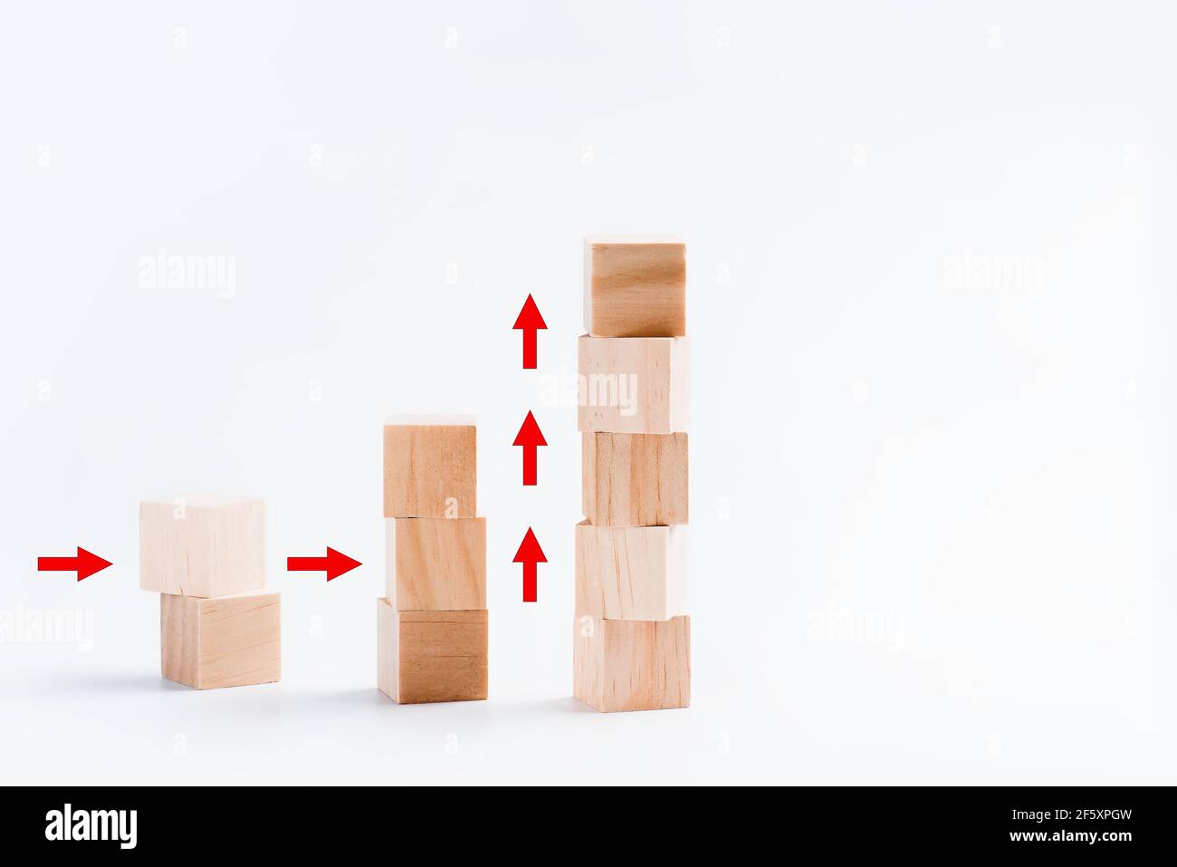 Wooden blocks with arrows of growth, the direction of the correct ...