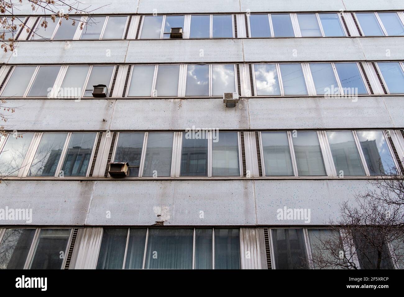 Office building windows early spring. Reflections in large windows ...