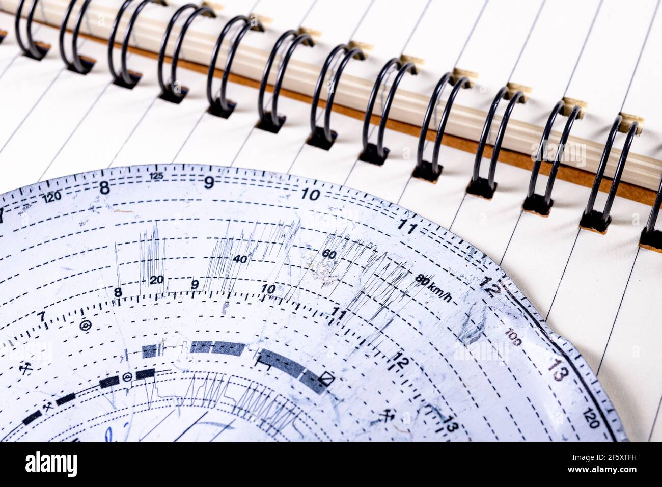 Tachograph charts and notebook. Record of working time of professional ...