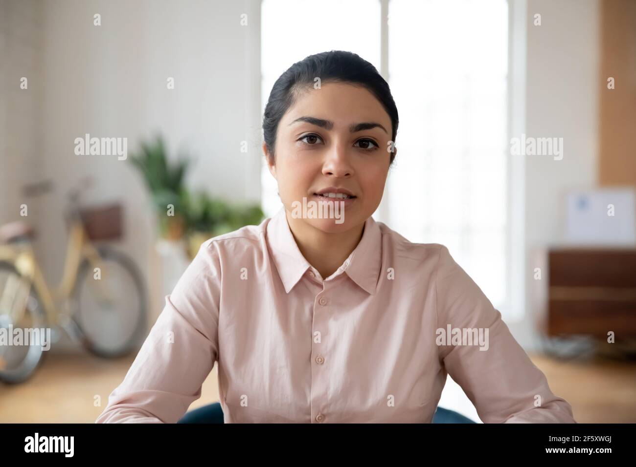 Portrait of young Indian woman talk on video call Stock Photo - Alamy