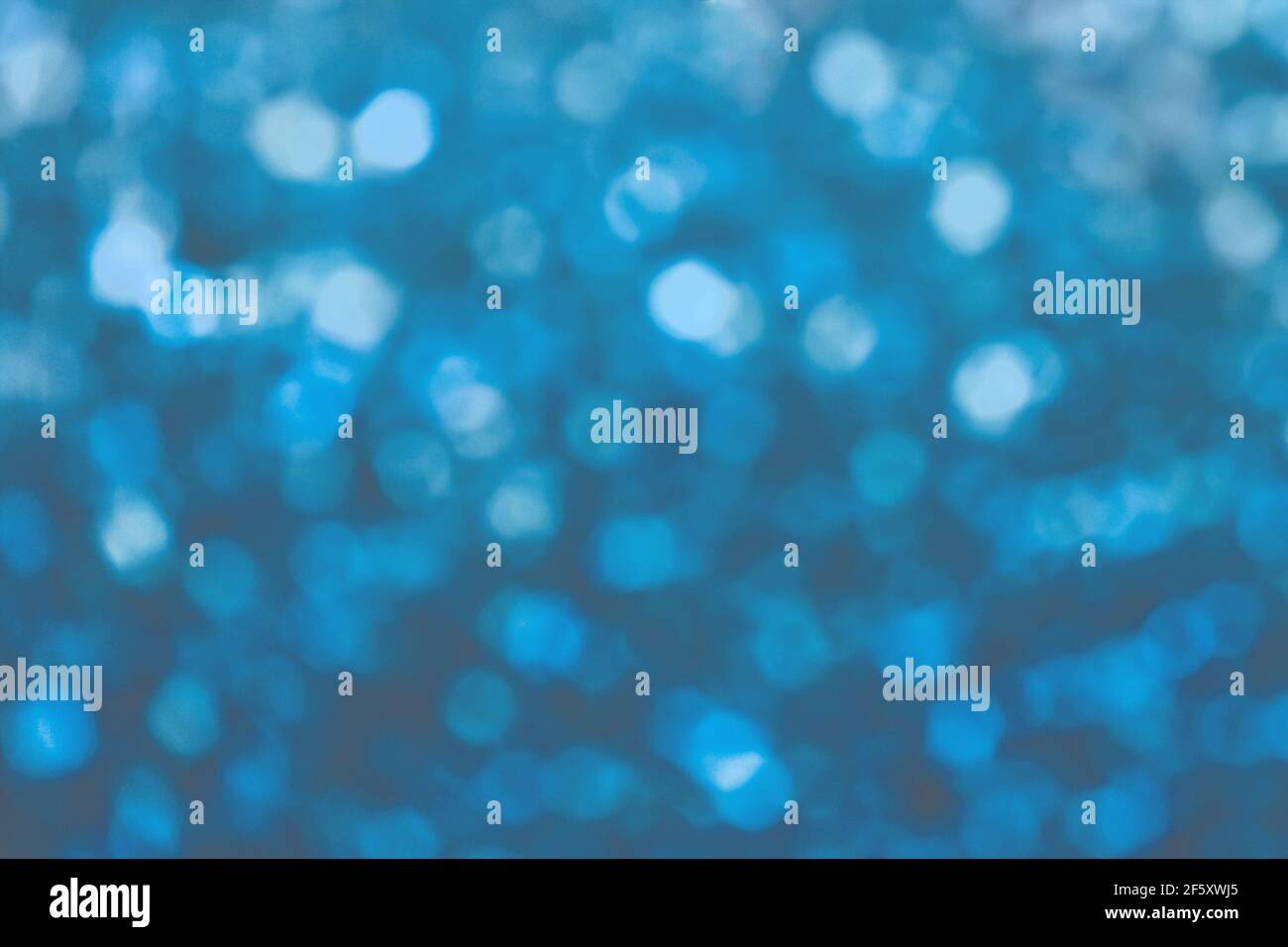 Blurred cold blue background, water texture, bokeh with highlights ...