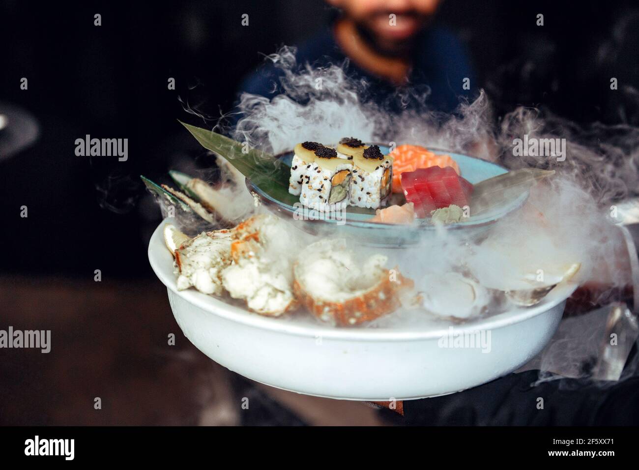 plate with ice and smoke oyster and food Stock Photo - Alamy