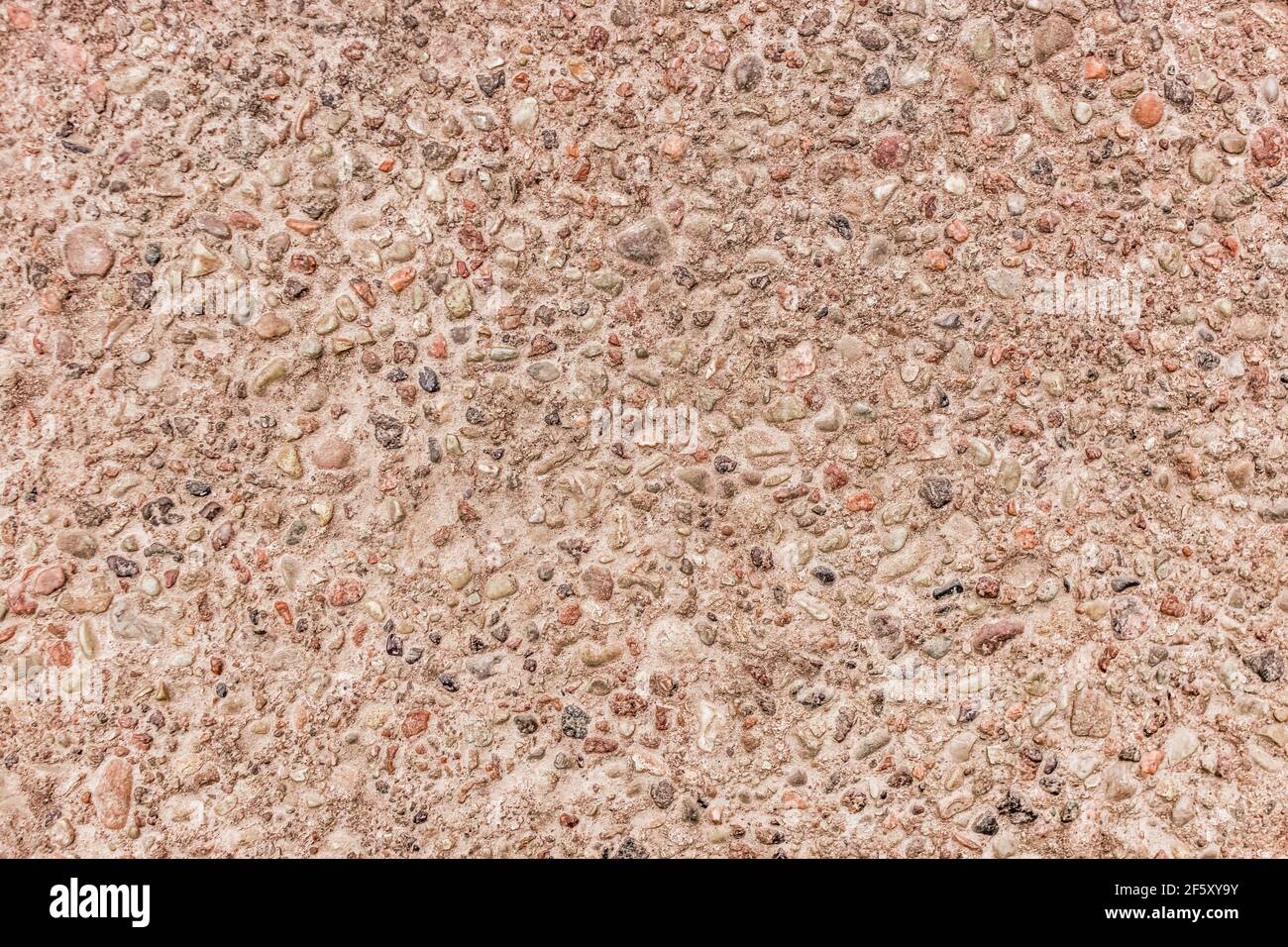 Small stones in concrete slab surface wall texture background Stock ...