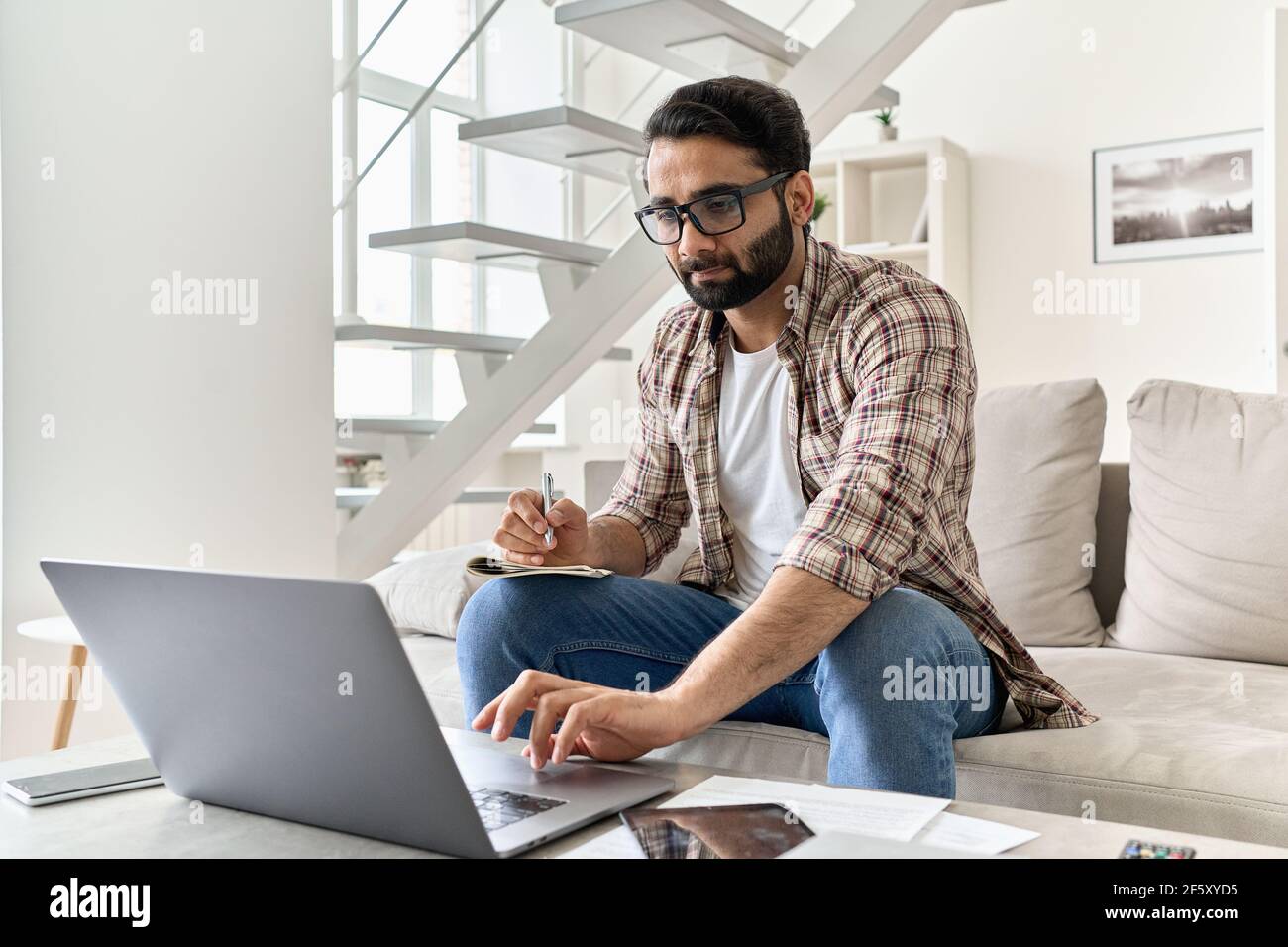 Indian man working hi-res stock photography and images - Alamy