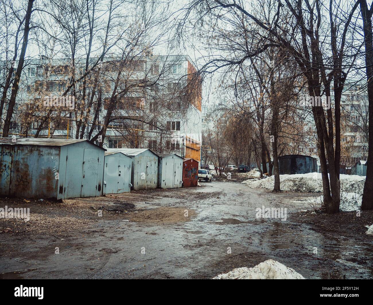 Winter and fall city depressive view with wet street Stock Photo - Alamy