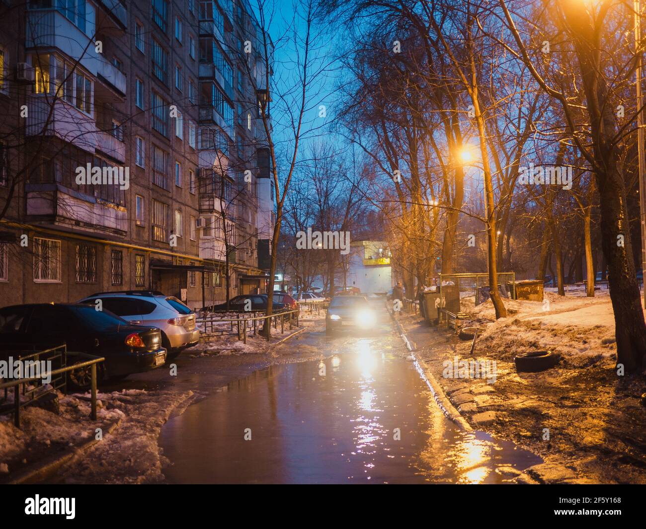 Winter and fall city depressive view with wet street after rain Stock ...