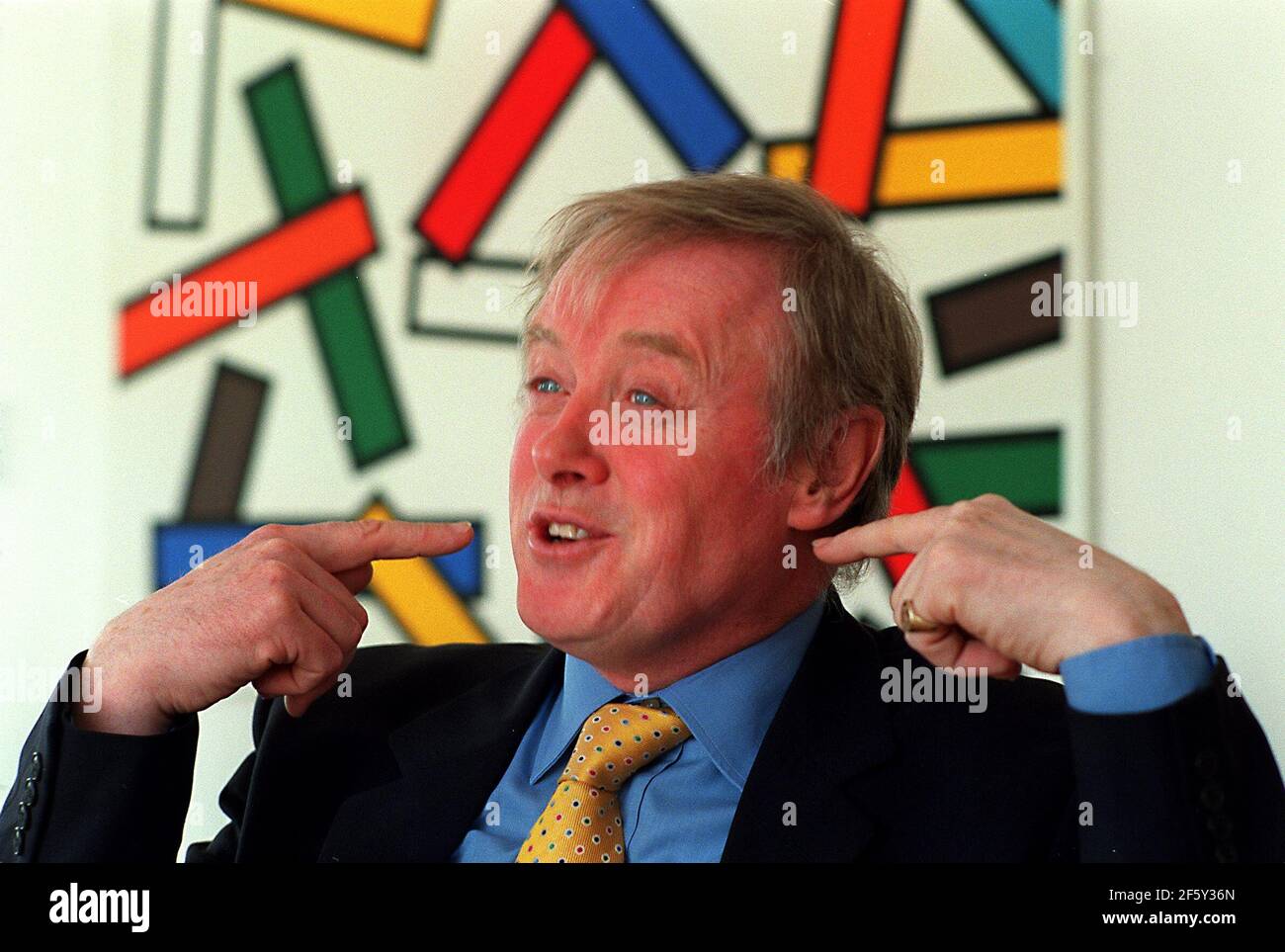Gerry Robinson being interviewd by David LIster July 1999 Stock Photo ...