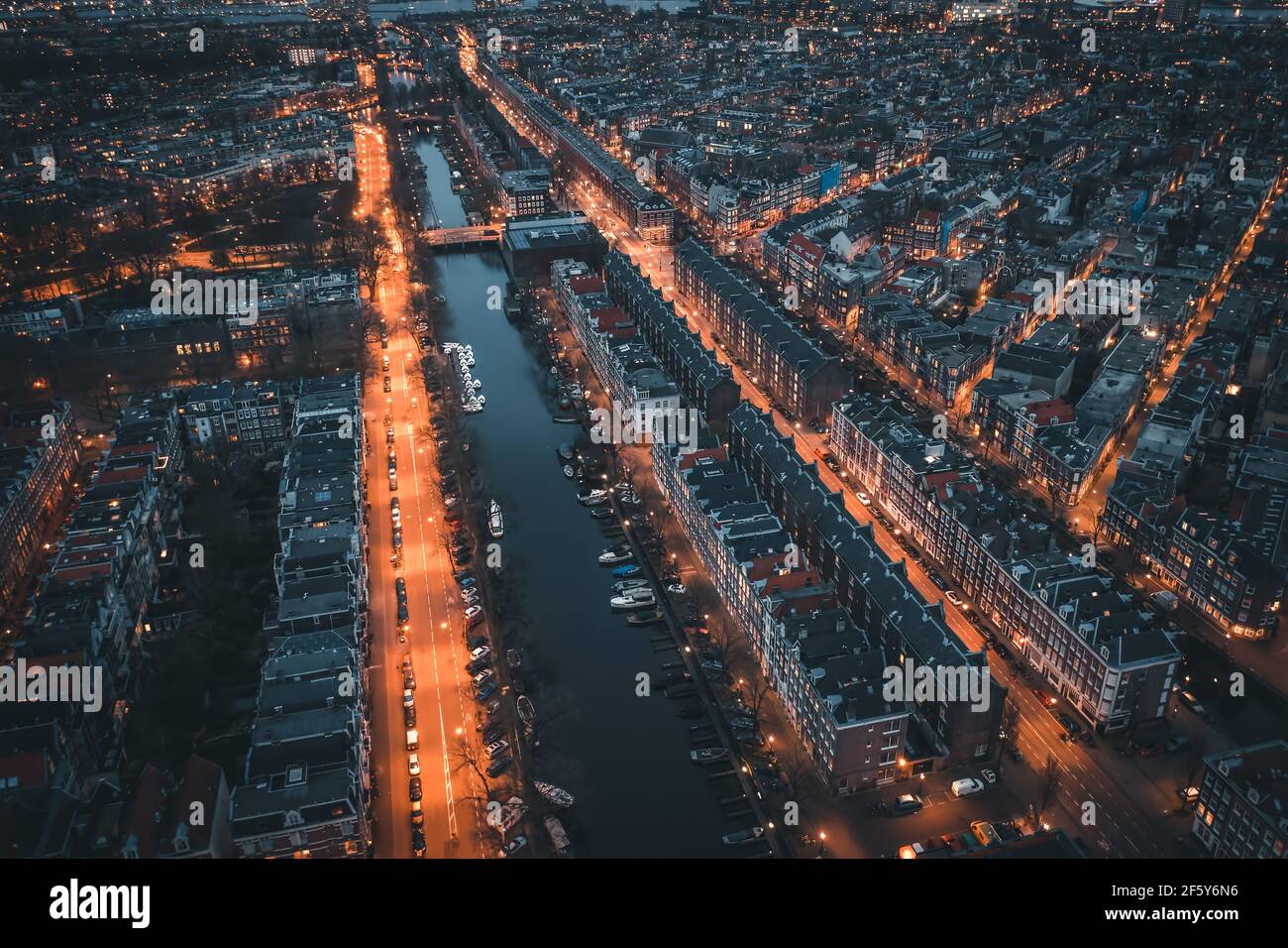 Amsterdam, Netherlands. Aerial top view of old city from above at night ...