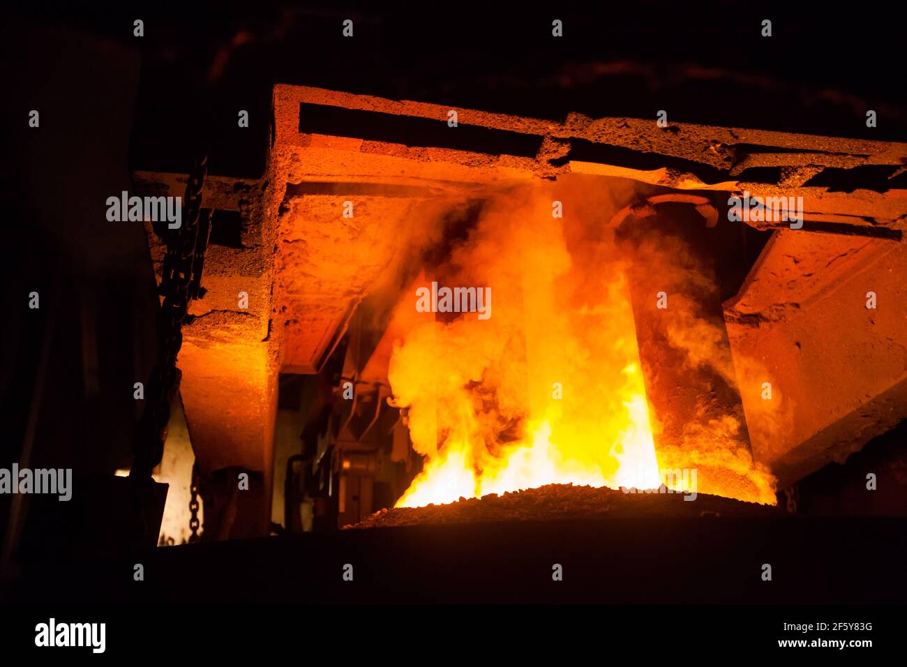 Close up of electrodes of electric arc furnace. Sokolovo-Sarbay mining ...