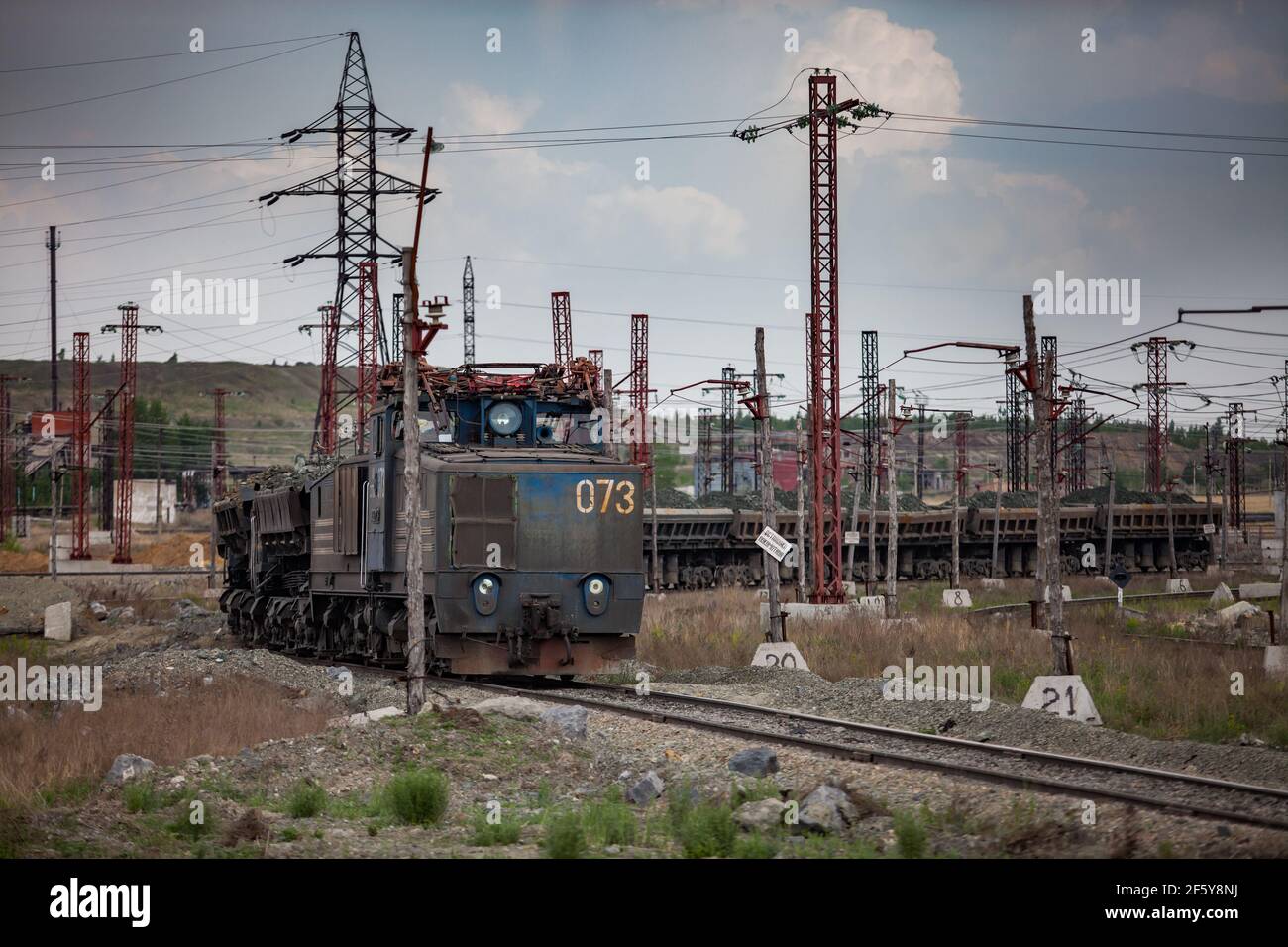 Rudny,Kazakhstan - May 14 2012:Open-pit mining iron ore. Railway train ...