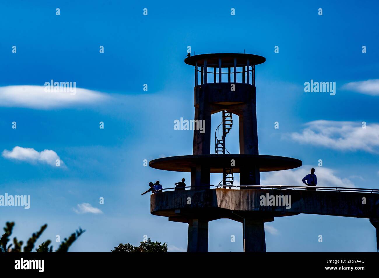 The Observation Tower with tourists shilhouetted against the sky at ...