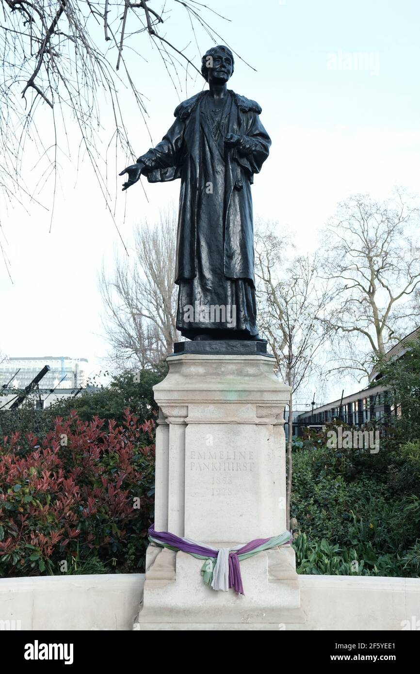 A statue of suffragette Emmeline Pankhurst stands in behind Parliament ...