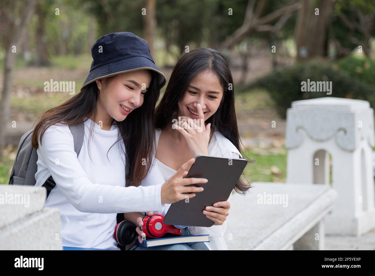 Female sitting pointing hi-res stock photography and images - Alamy