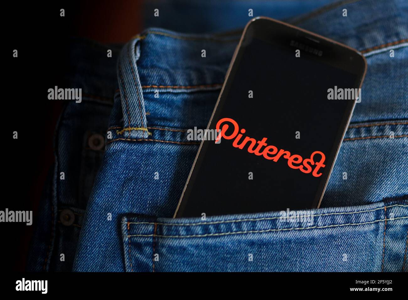 In this photo illustration, a Pinterest logo seen displayed on a ...