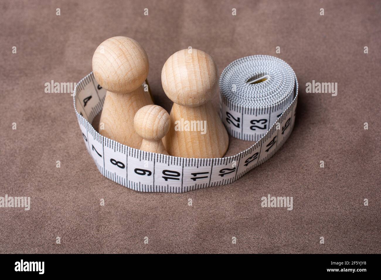 Little tiny man person figurines of family members Stock Photo - Alamy