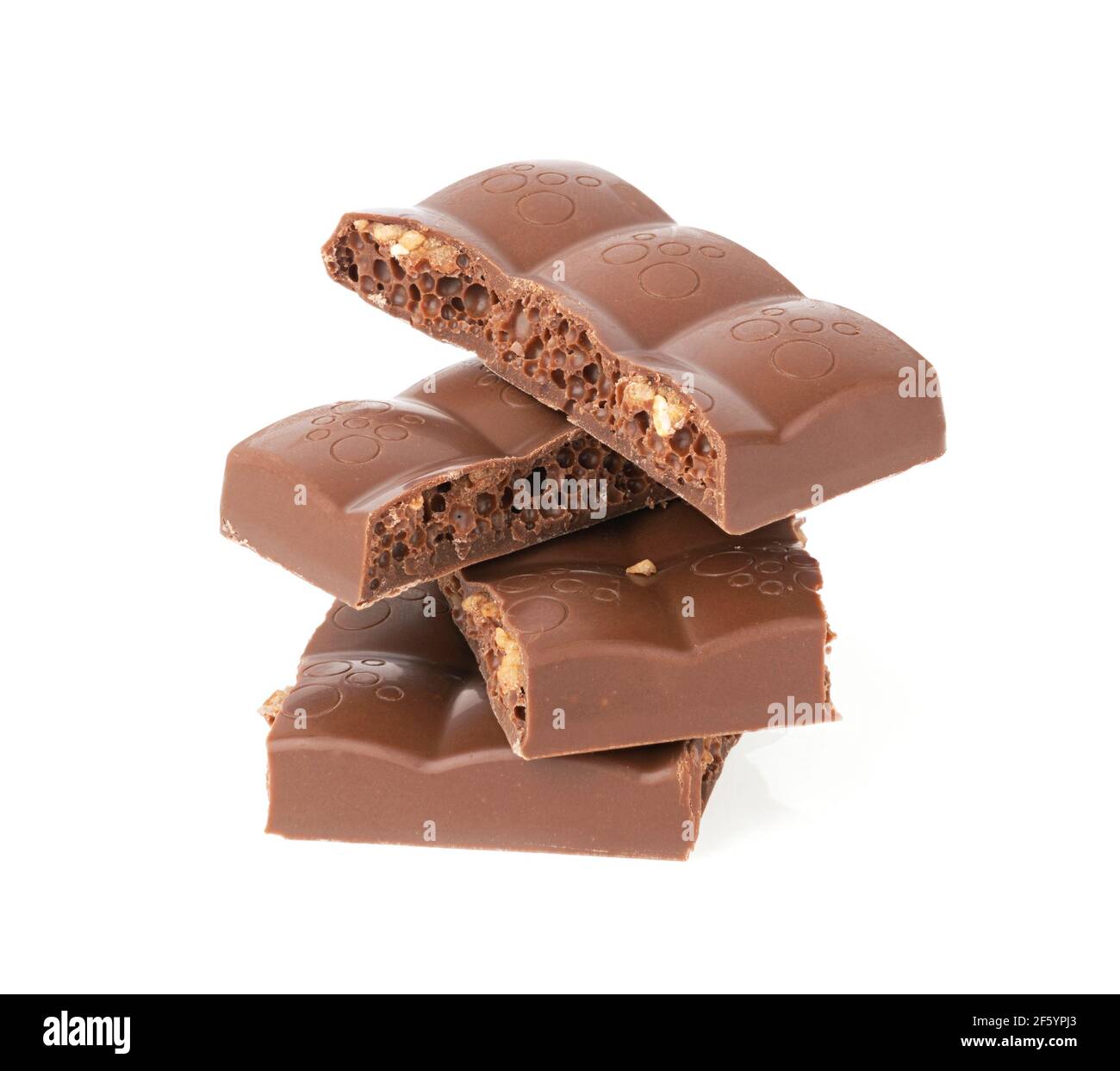 Broken porous chocolate bars in a stack isolated on white background ...