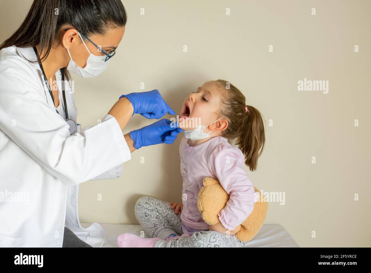 Examining child nose hi-res stock photography and images - Alamy