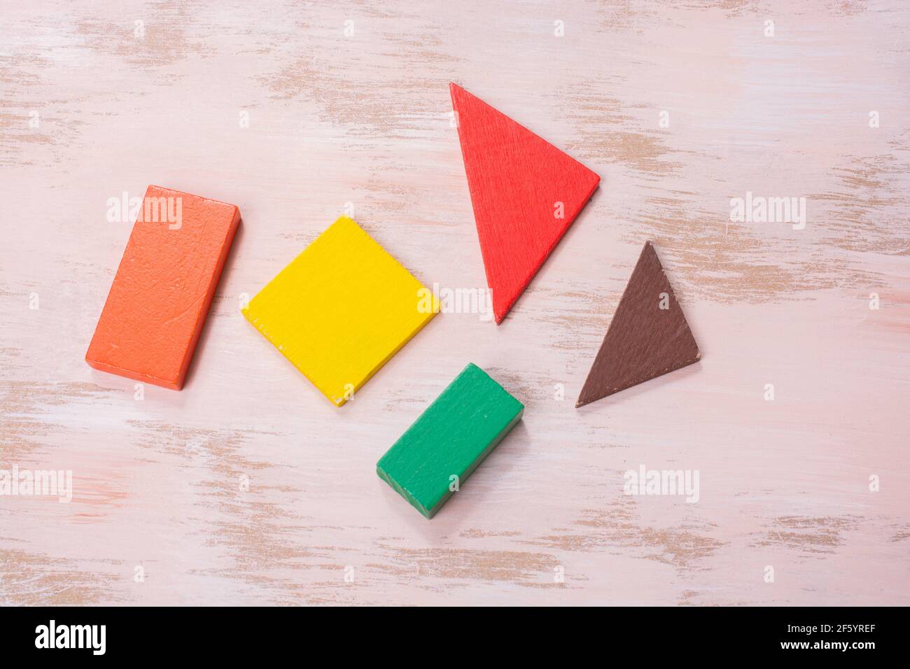 Concept of creative logical thinking. Different colorful wooden blocks ...