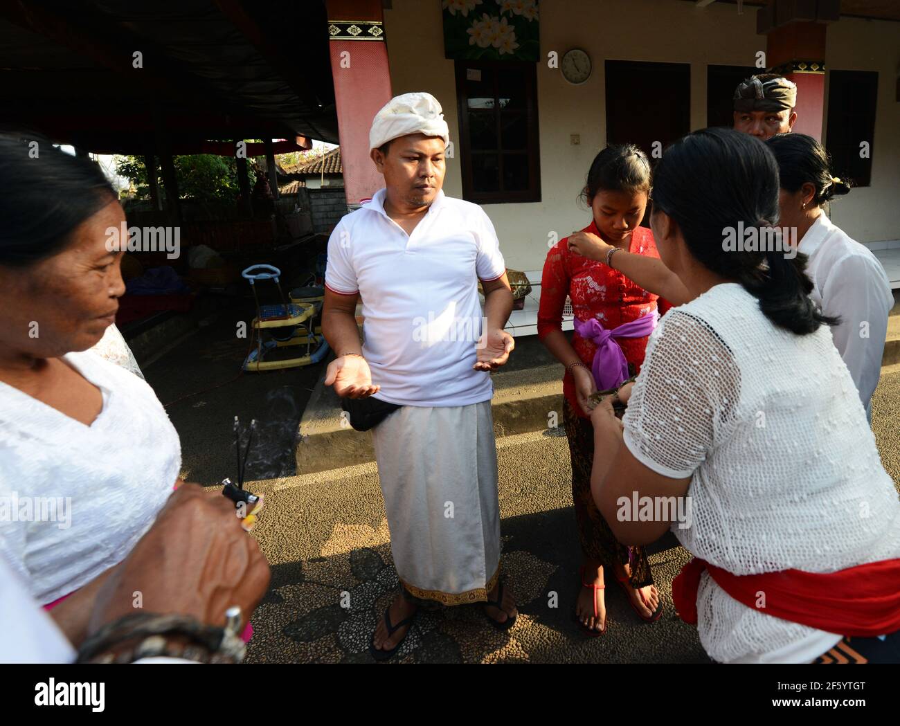 A Pre marriage blessing ceremony in a small Hindu temple in Ubud, Bali ...