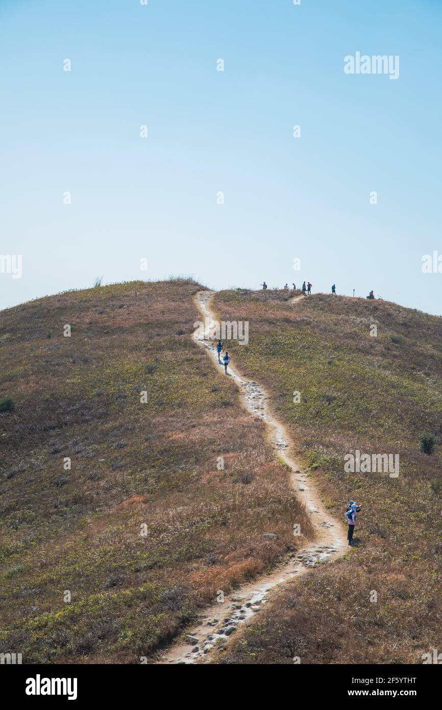 Crowd, many people walking along the footpath of hiking trail, Hong ...