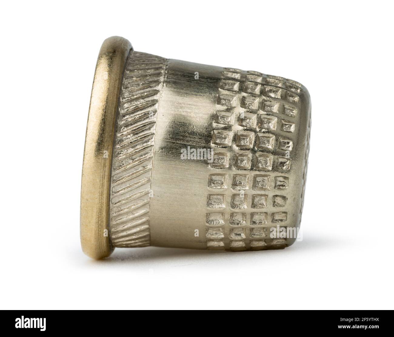Metal sewing thimble isolated on white Stock Photo - Alamy