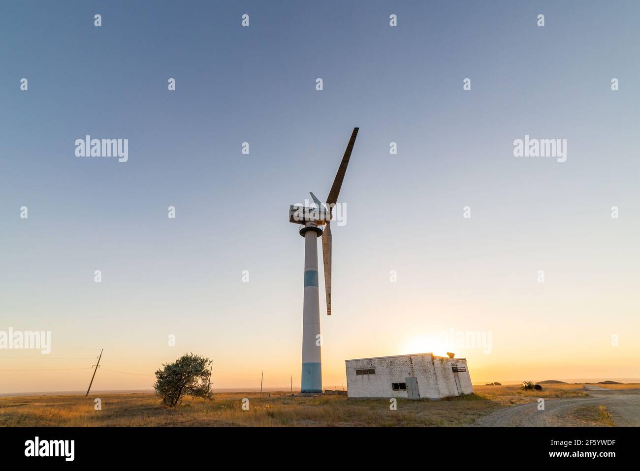 Old abandoned wind turbines in the desert landscape Stock Photo - Alamy