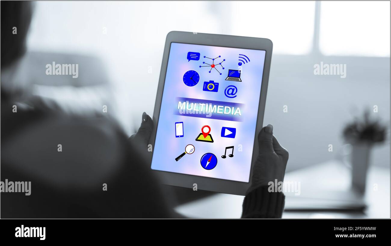 Tablet screen displaying a multimedia concept Stock Photo - Alamy