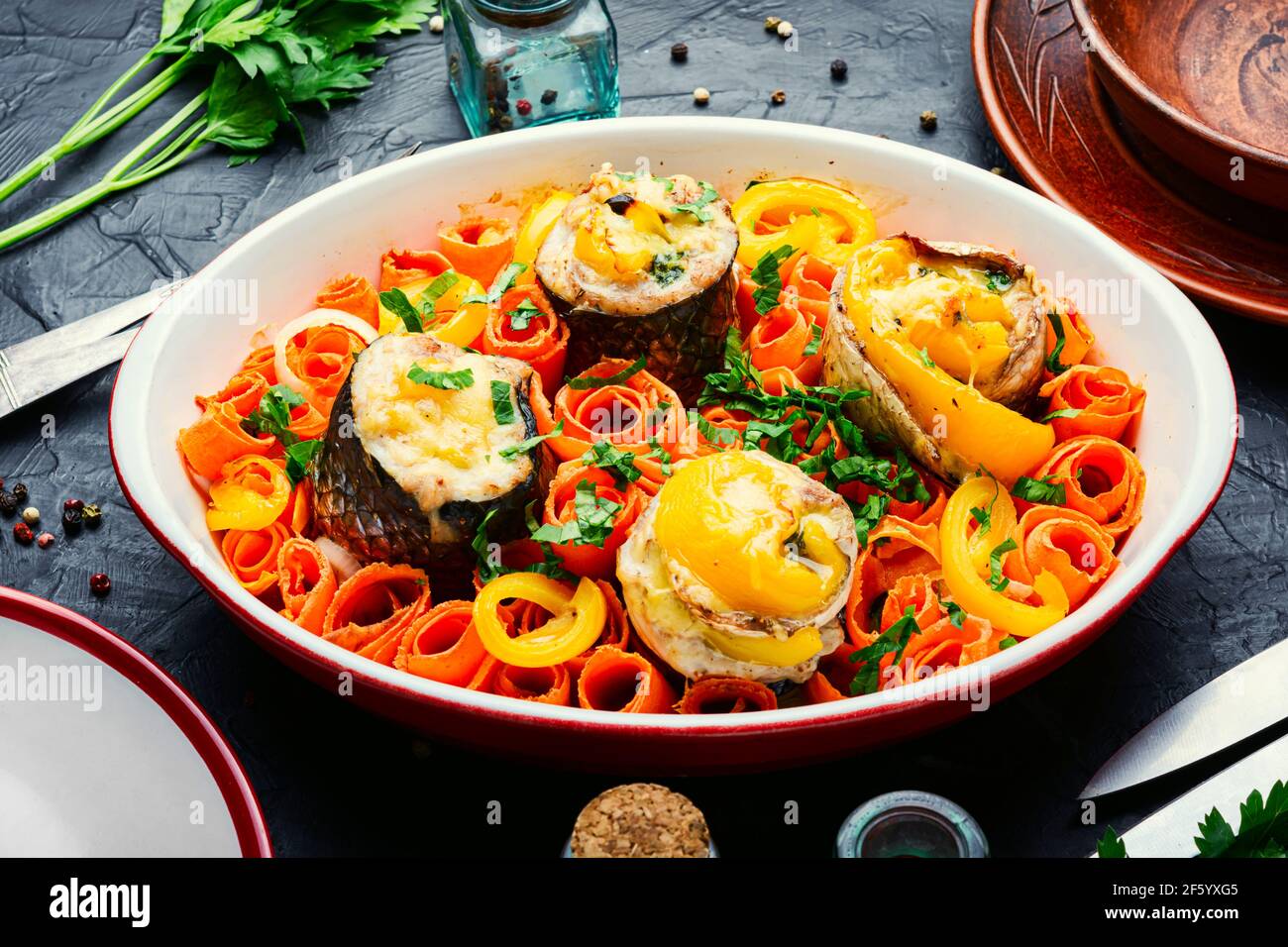 Diet fish rolls baked with cheese and vegetables.Rolls of fish fillet ...