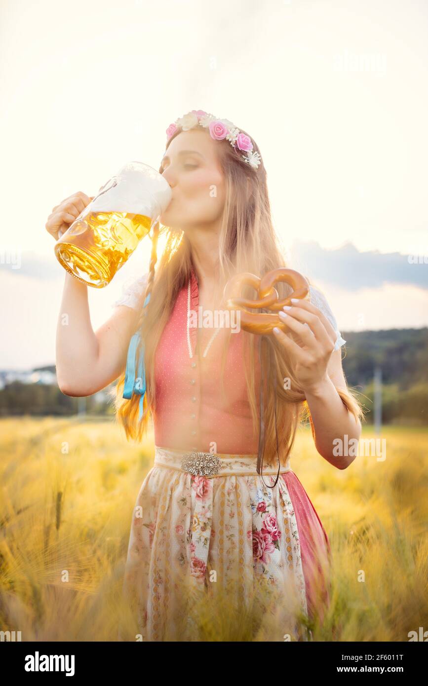 Traditional german costume girl with beer oktoberfest hi-res stock ...