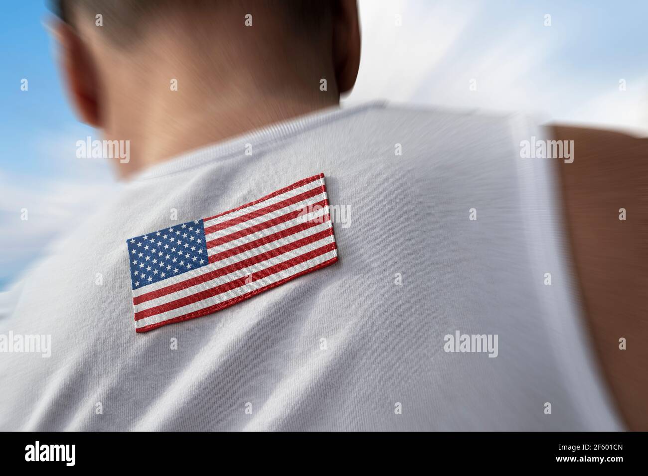 The national flag of United States of America on the athlete's back ...