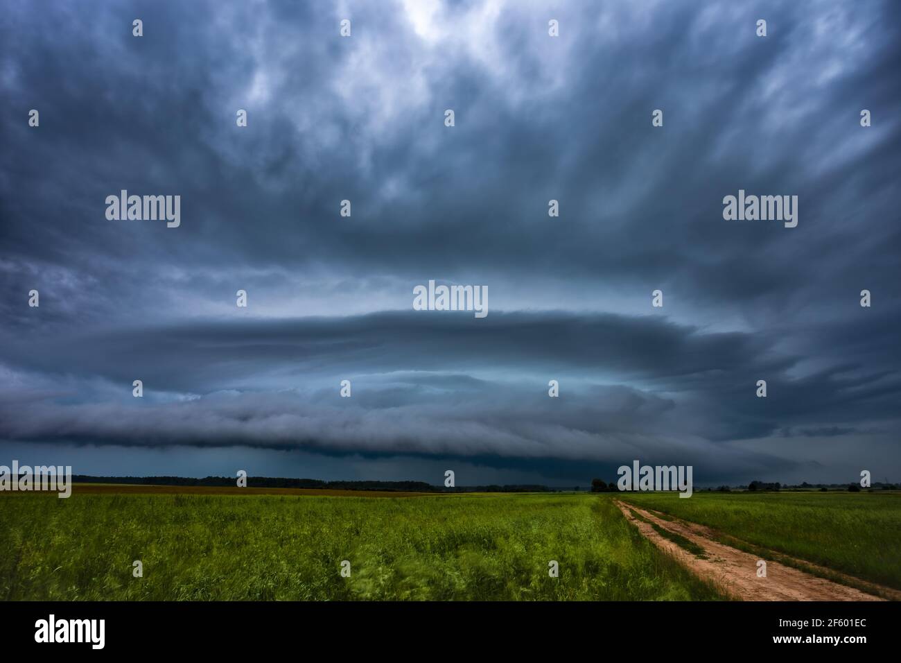 Supercell storm clouds with wall cloud and intense rain Stock Photo - Alamy