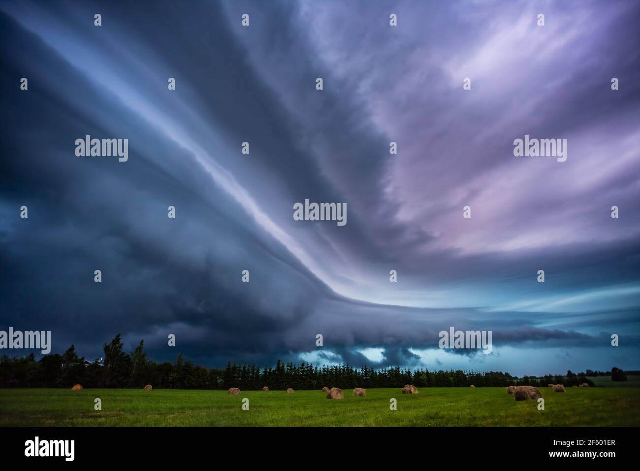 Supercell storm clouds with wall cloud and intense rain Stock Photo - Alamy