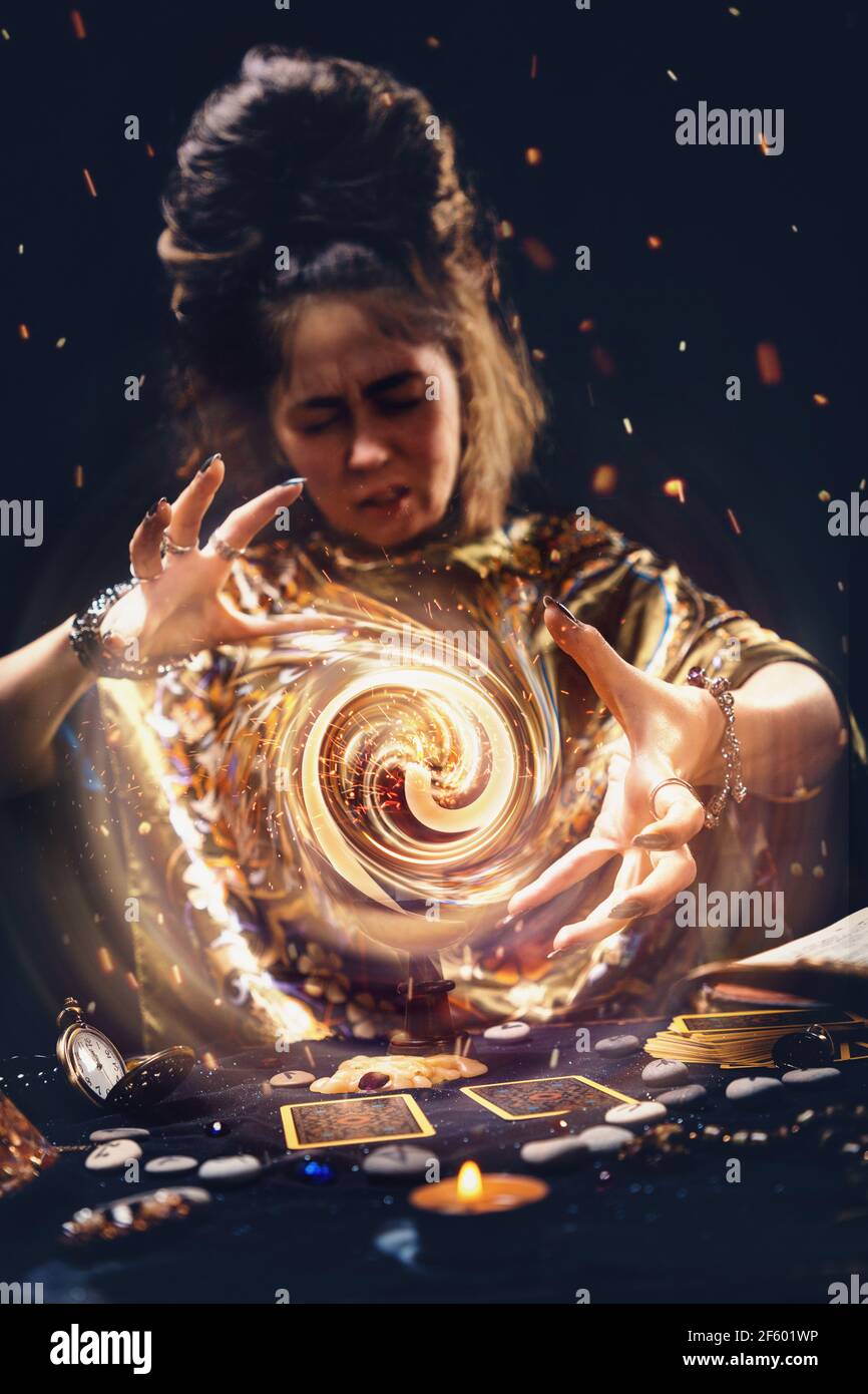Conjuring and spell hands hi-res stock photography and images - Alamy