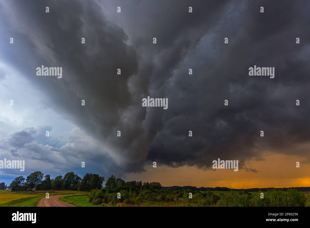 Supercell storm clouds with wall cloud and intense rain Stock Photo - Alamy