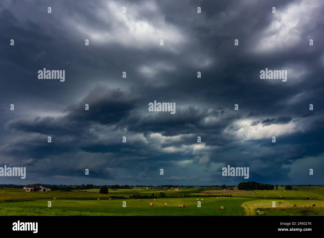 Supercell storm clouds with wall cloud and intense rain Stock Photo - Alamy