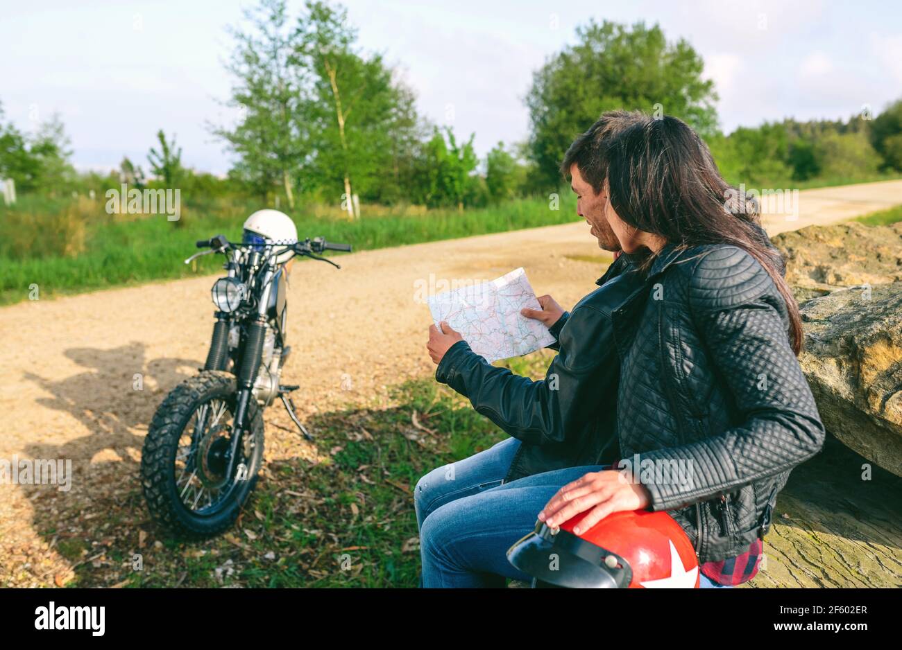 Biker looking at map hi-res stock photography and images - Alamy