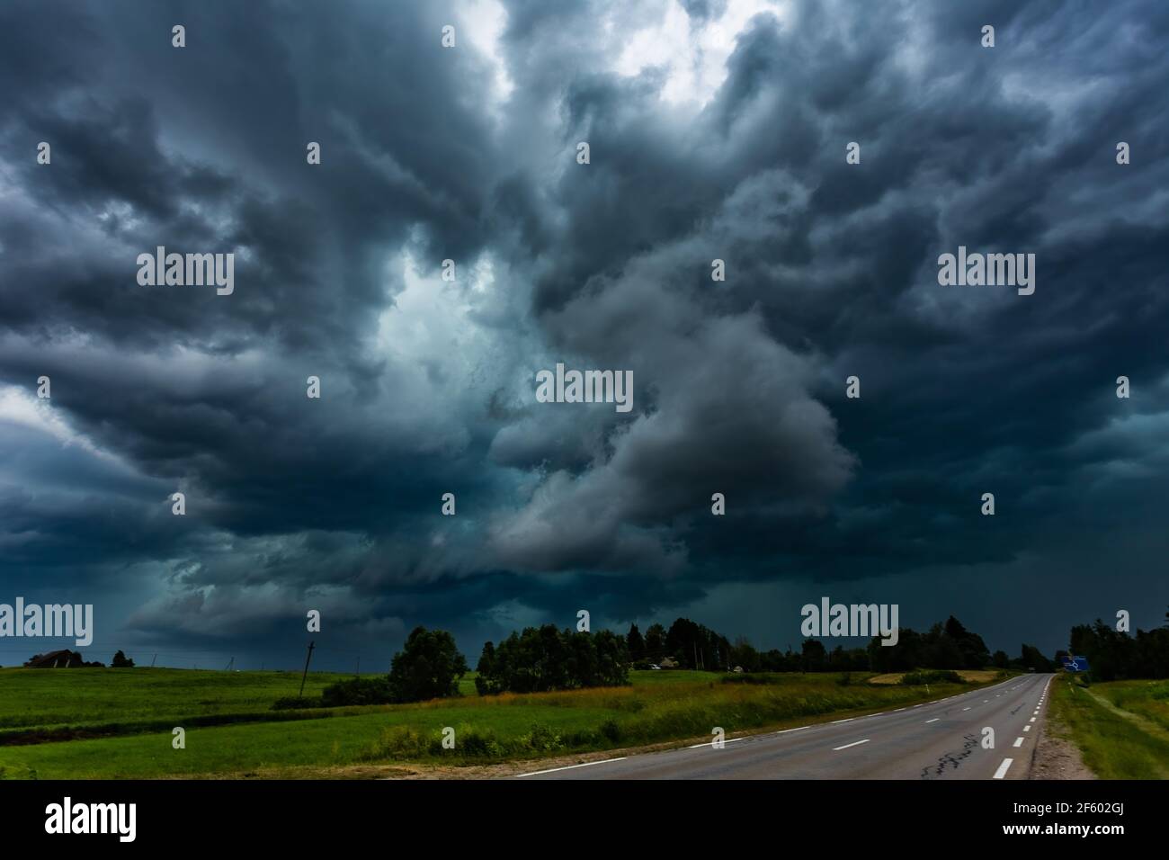 Stormy weather with intense rain, summer storm Stock Photo - Alamy