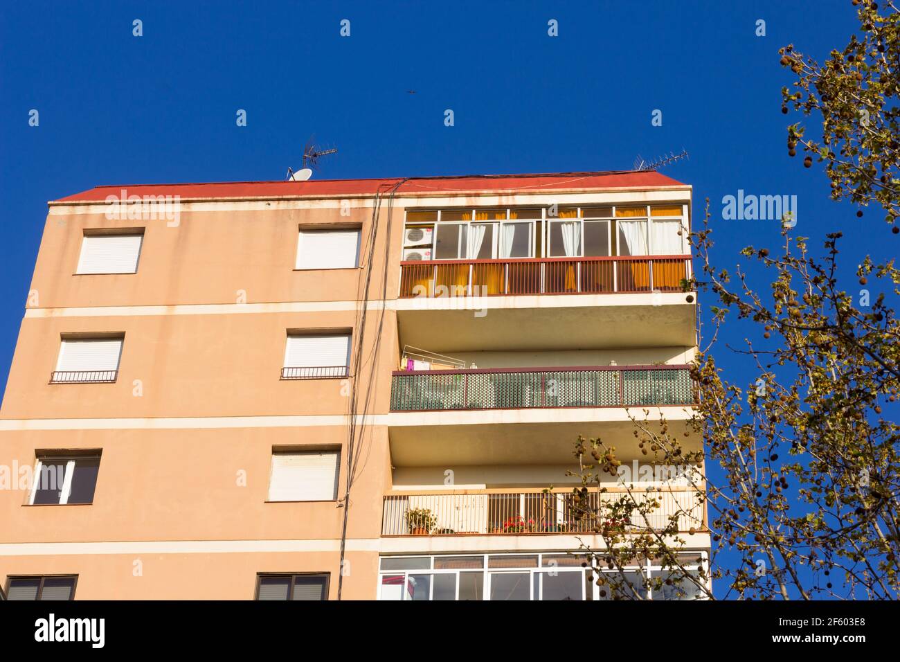 Cornices of buildings against a background of blue sky; angles formed ...