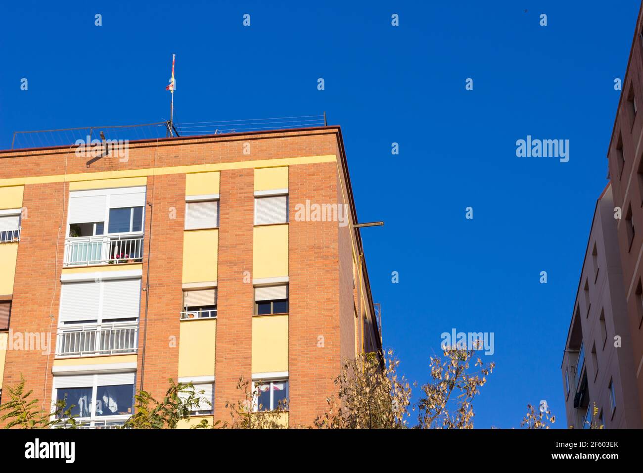 Cornices of buildings against a background of blue sky; angles formed ...
