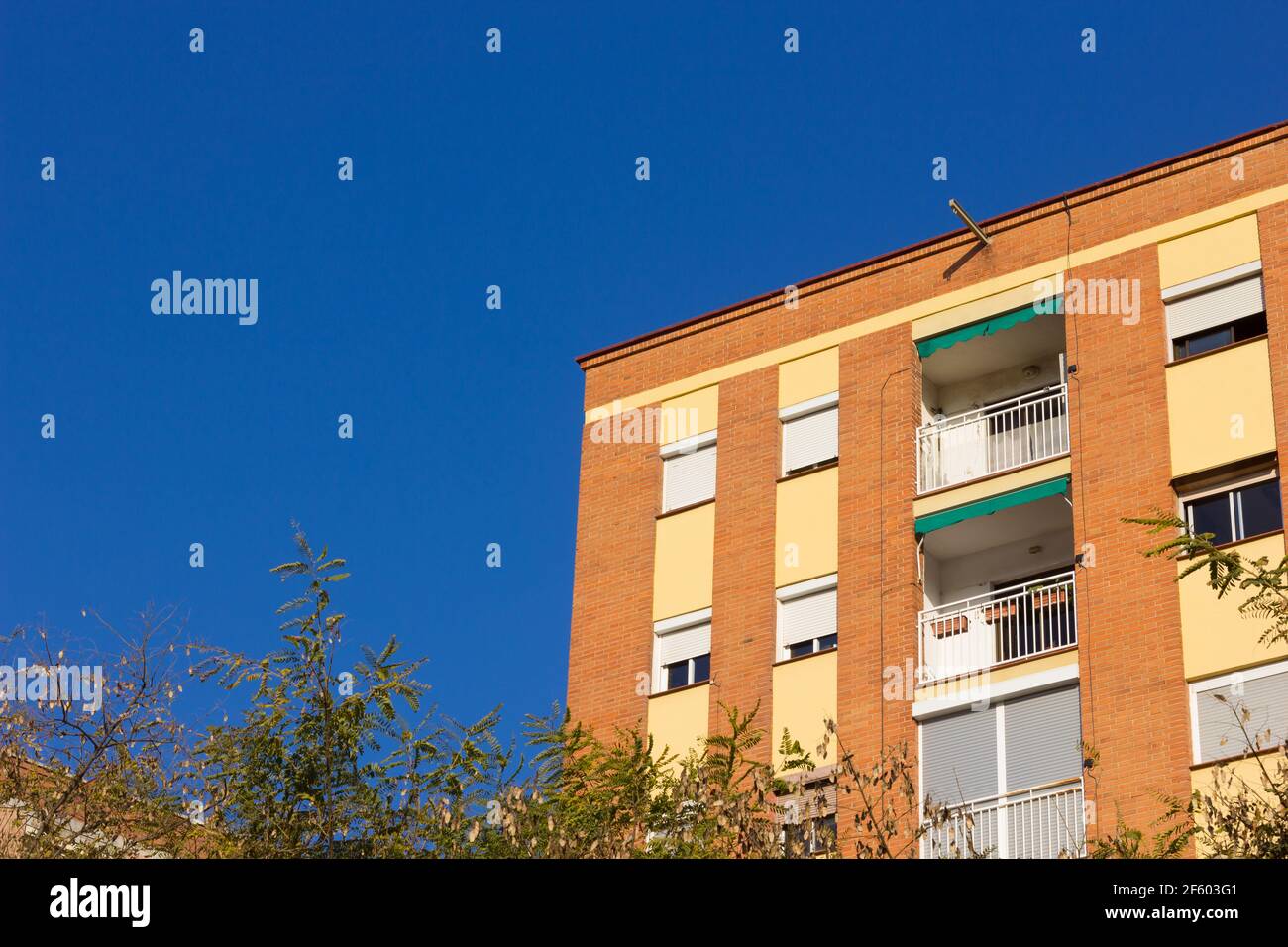 Cornices of buildings against a background of blue sky; angles formed ...