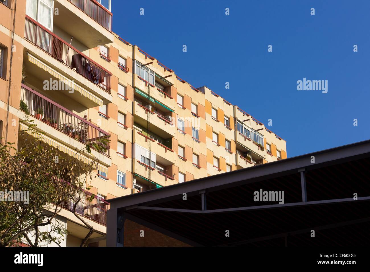 Cornices of buildings against a background of blue sky; angles formed ...