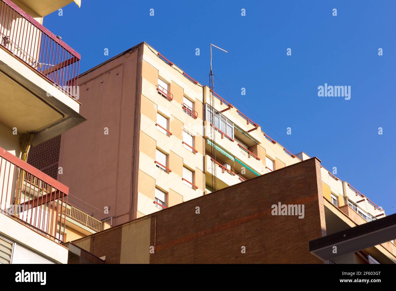 Cornices of buildings against a background of blue sky; angles formed ...