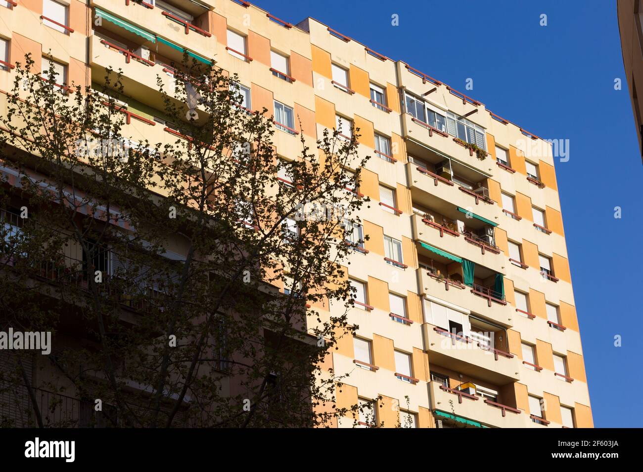 Cornices of buildings against a background of blue sky; angles formed ...