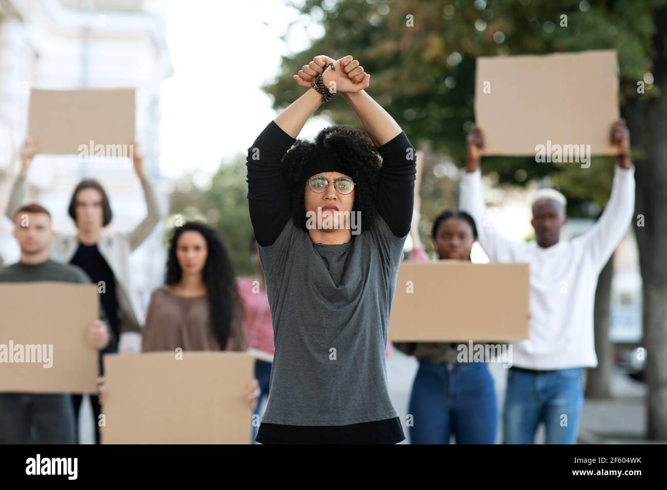 Young man activist leading international group of students Stock Photo ...