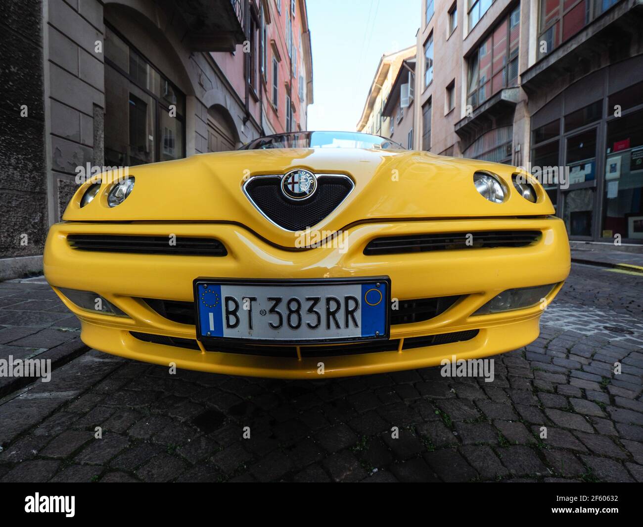 yellow Alfa Romeo Spider GTV cabriolet roadster Stock Photo - Alamy
