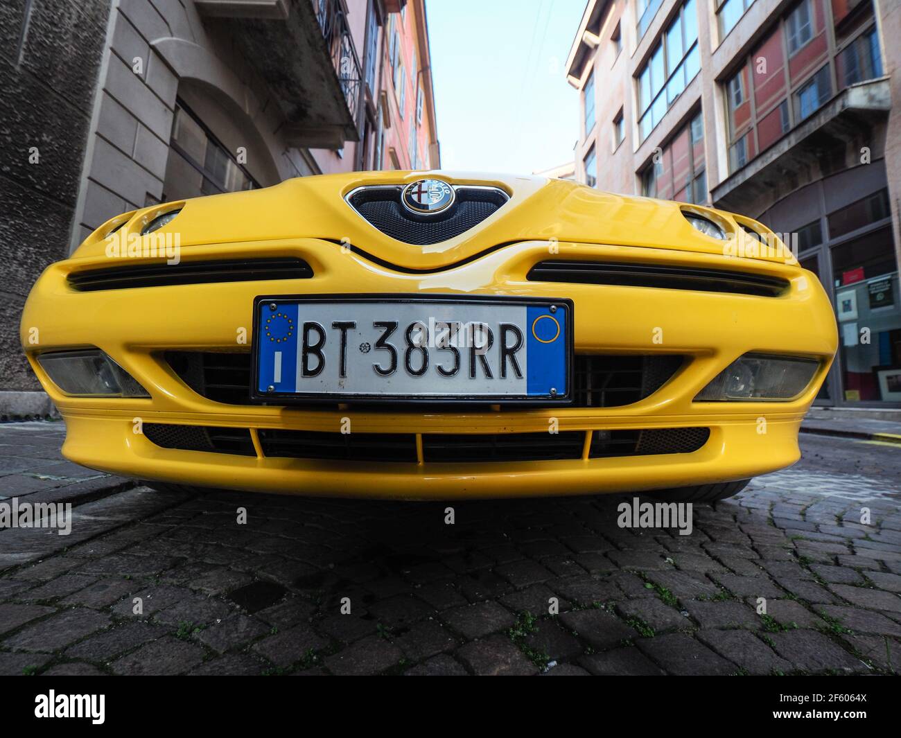 yellow Alfa Romeo Spider GTV cabriolet roadster Stock Photo - Alamy