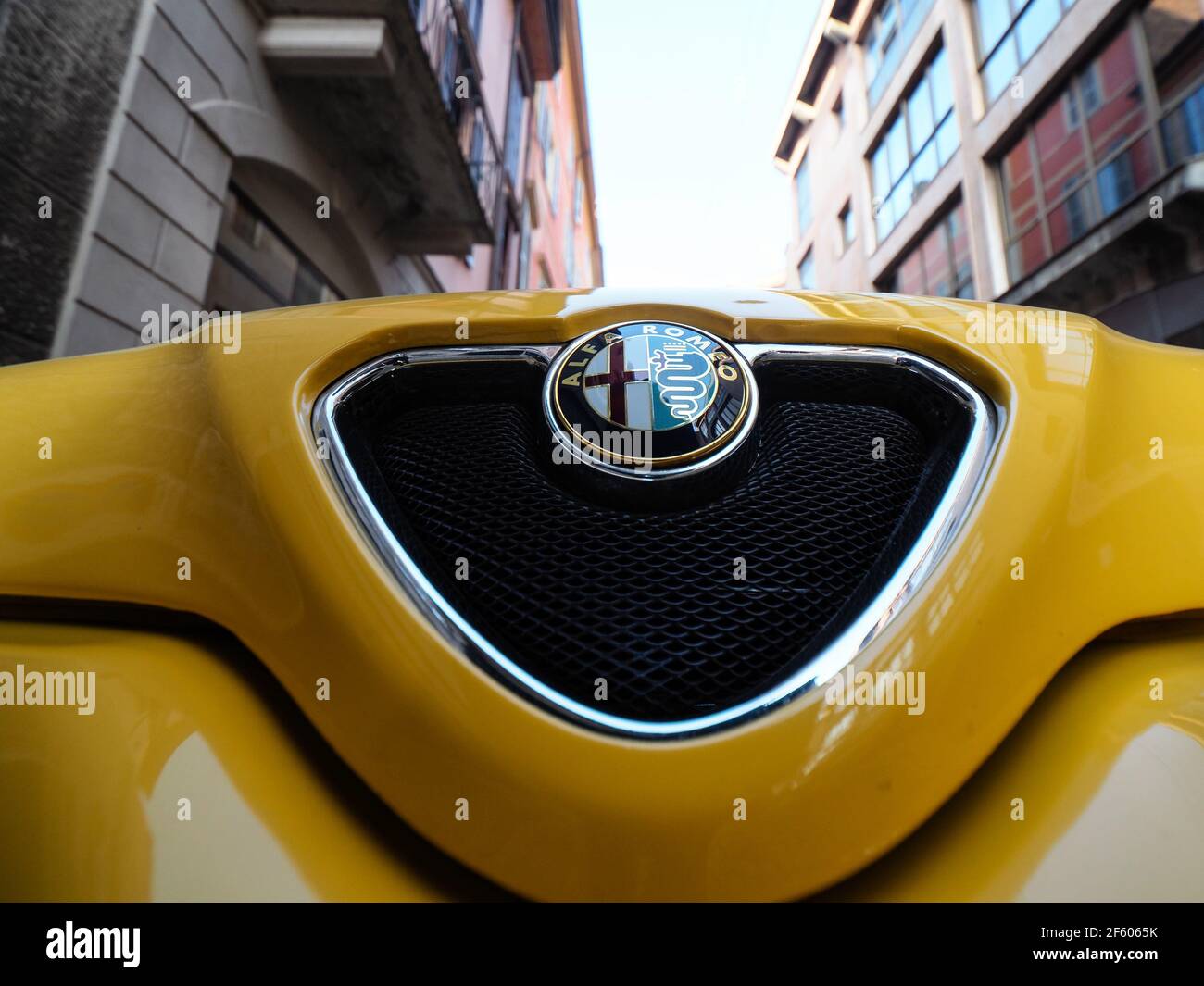 yellow Alfa Romeo Spider GTV cabriolet roadster Stock Photo - Alamy