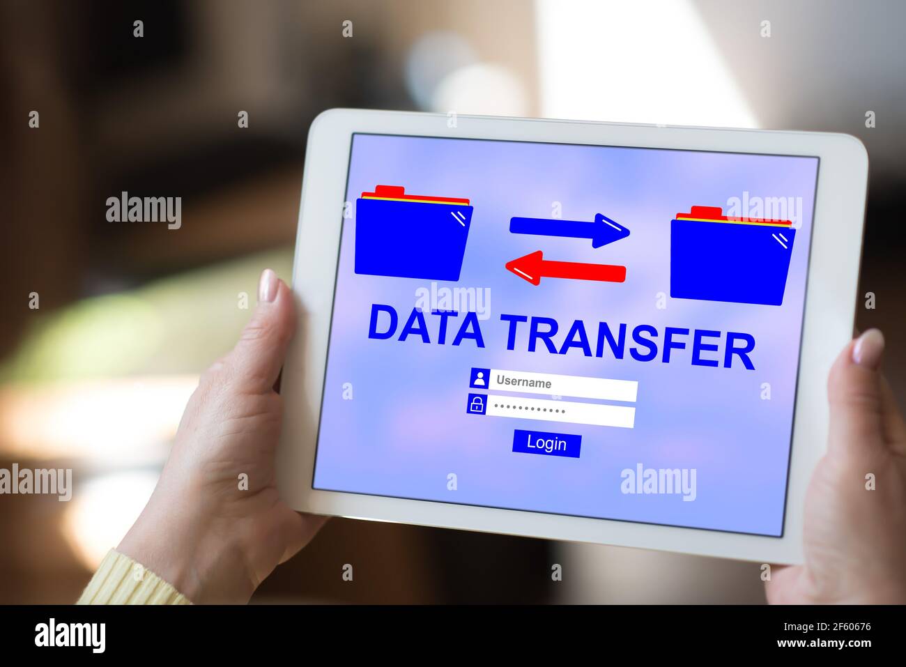 Tablet screen displaying a data transfer concept Stock Photo - Alamy