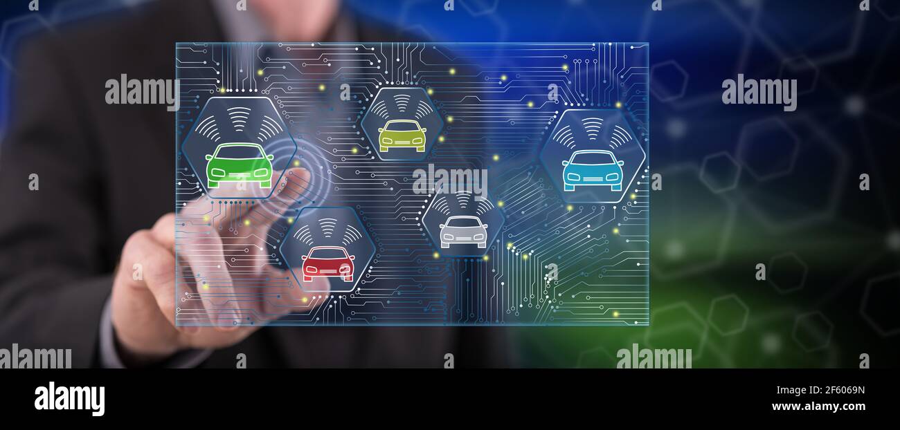 Man touching a smart car concept on a touch screen with his finger ...