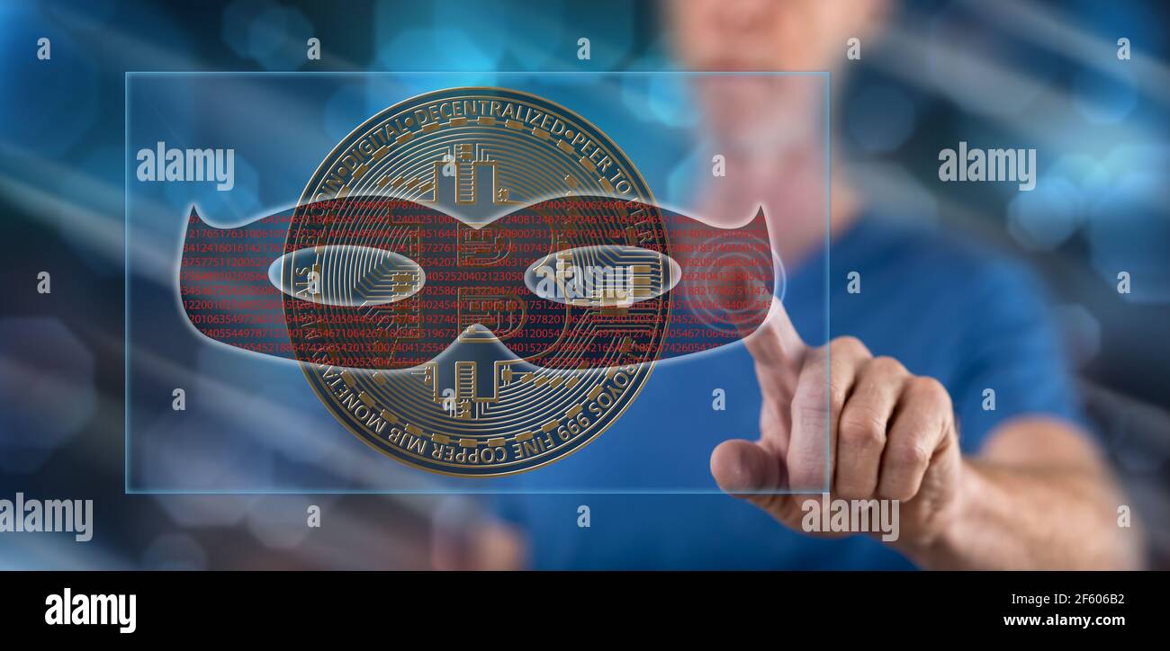 Man touching a bitcoin hacking concept on a touch screen with his ...
